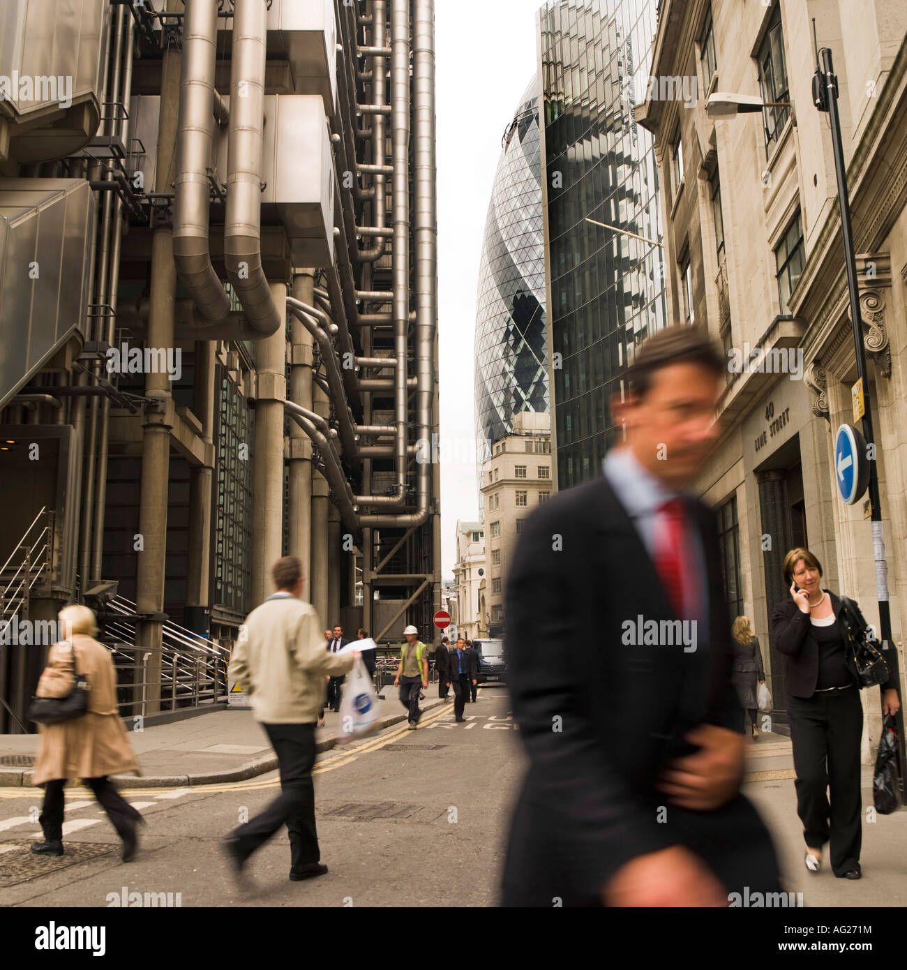 City worker businessman men people crowd group walking past Lloyds ...