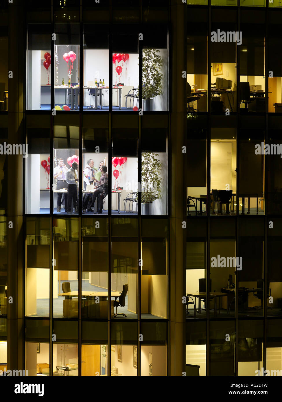 Group of business people having office party, view from building ...