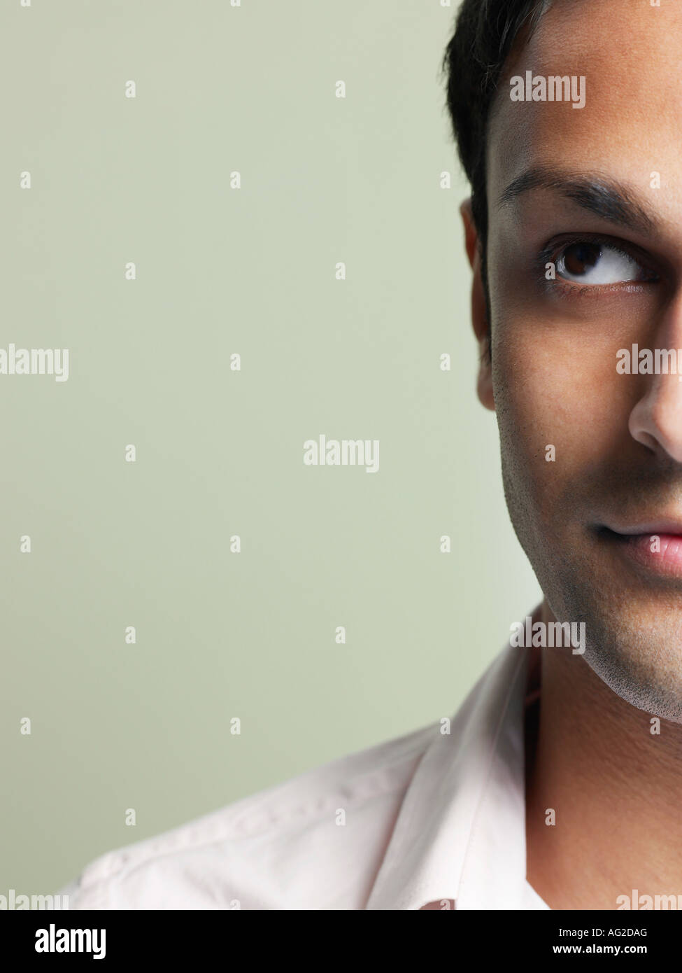 Mid adult man looking up, close-up (cropped Stock Photo - Alamy
