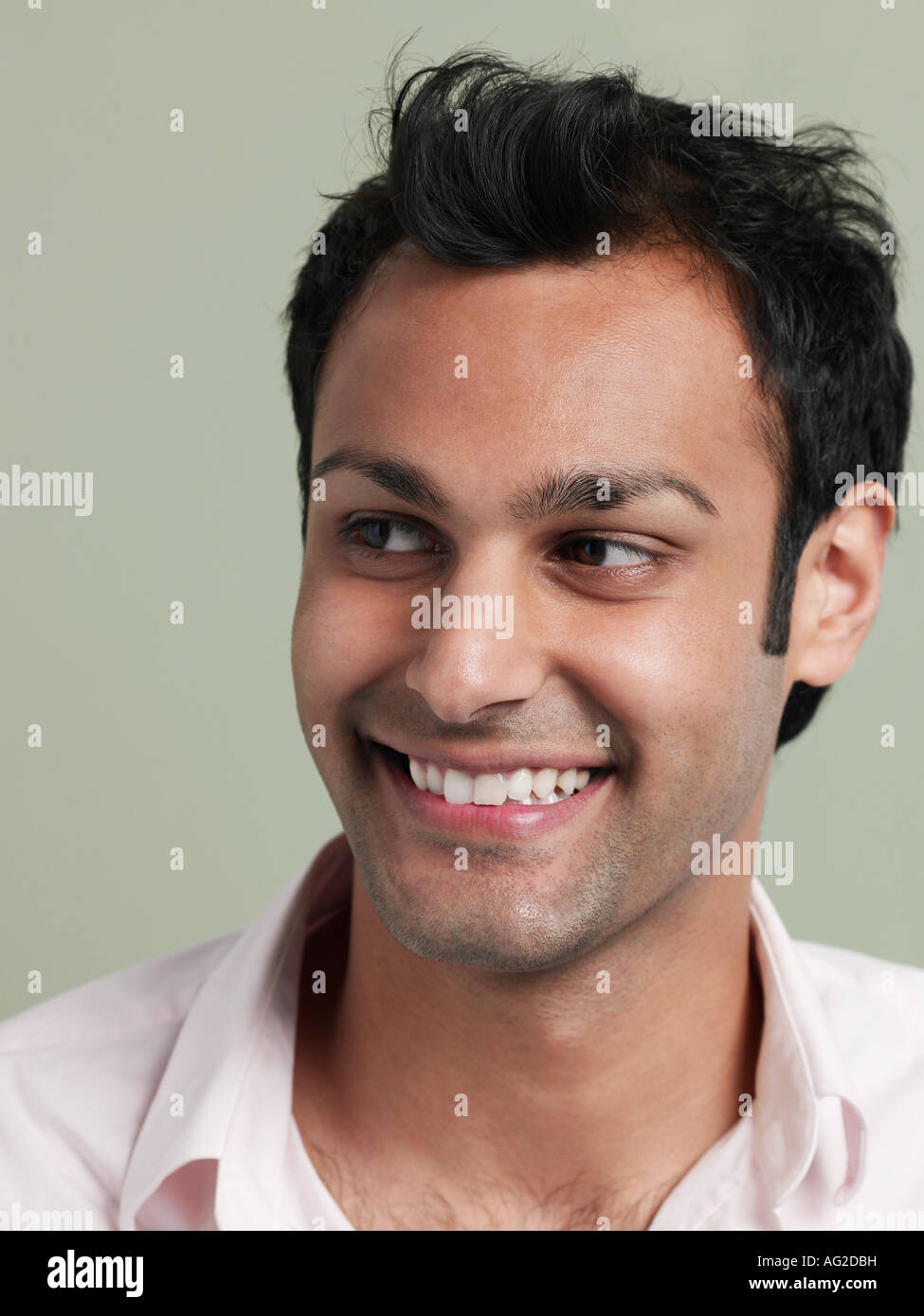Mid adult man looking away and smiling, close-up Stock Photo - Alamy