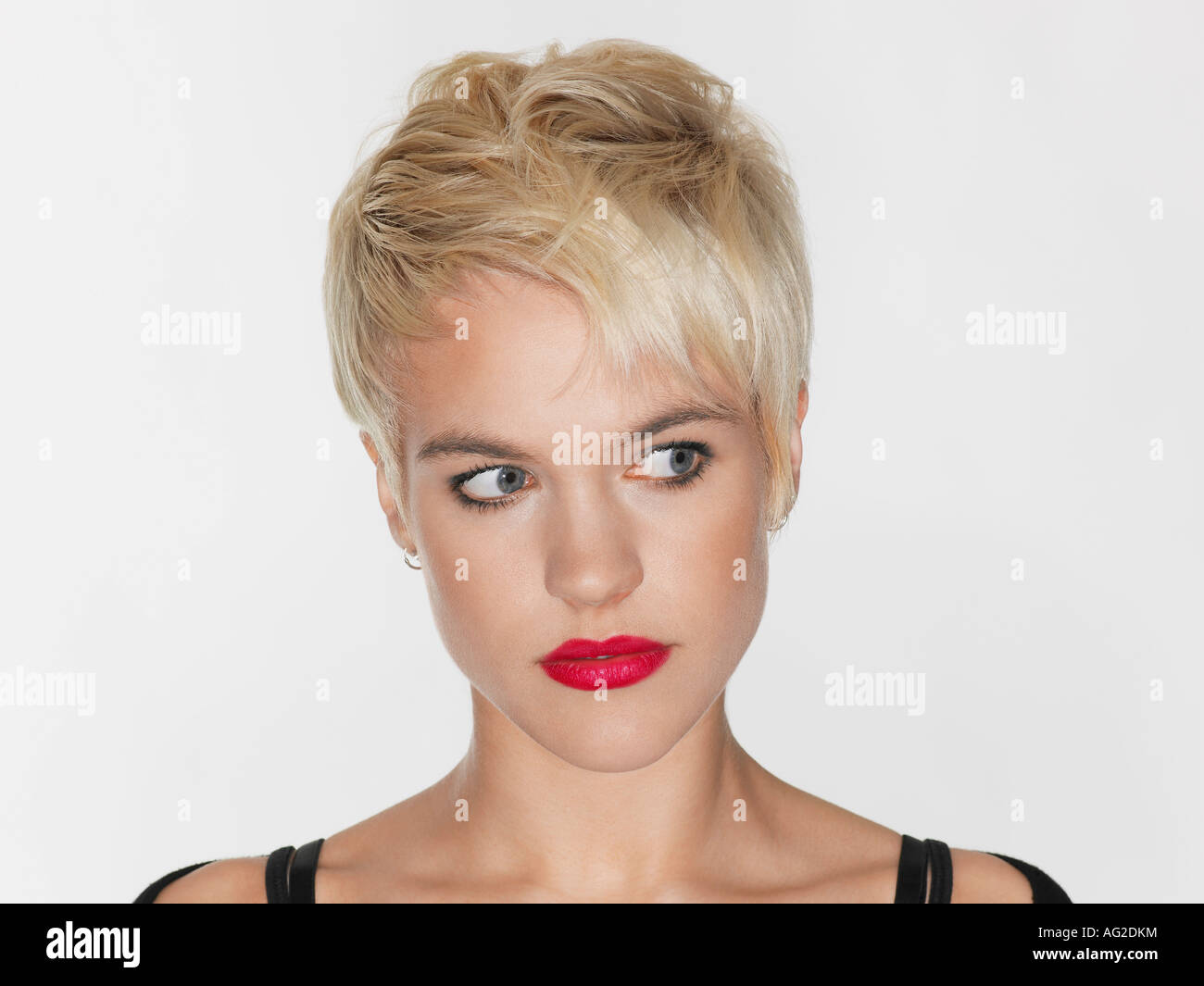 Young woman looking to side, close-up Stock Photo - Alamy