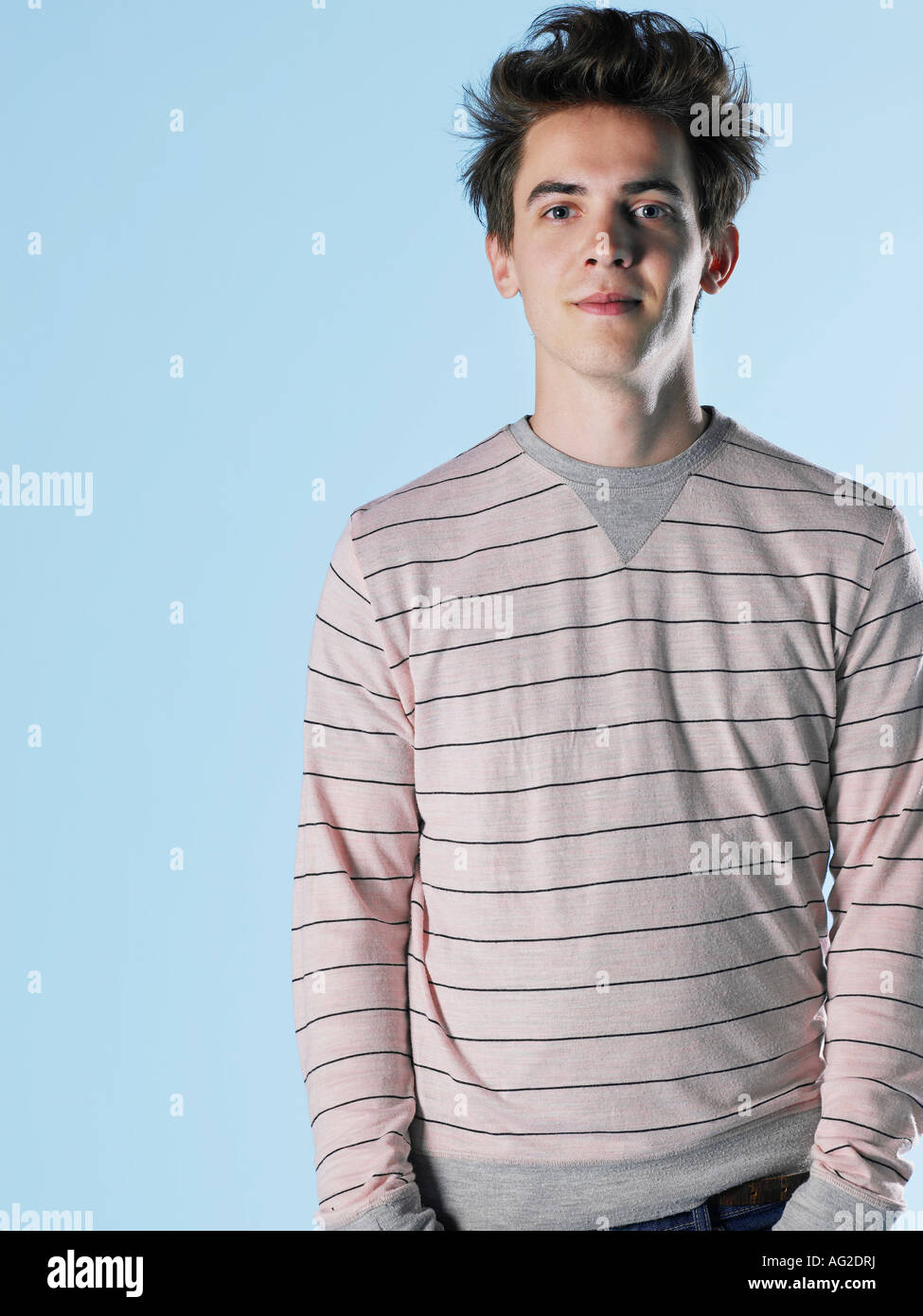 Portrait of smiling young man Stock Photo - Alamy