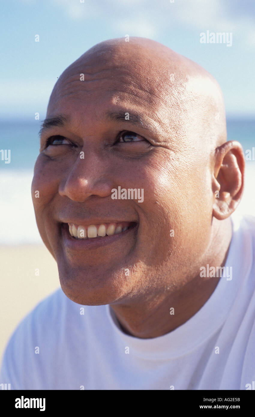 Hawaiian man on beach, Kauai, Hawaii Stock Photo - Alamy