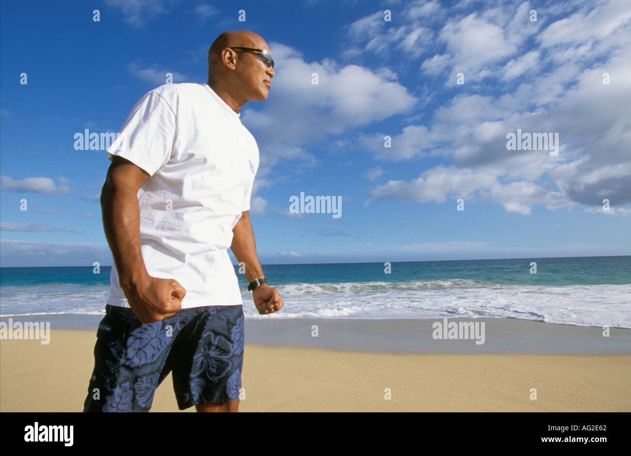 Hawaiian man on beach, Kauai, Hawaii Stock Photo - Alamy
