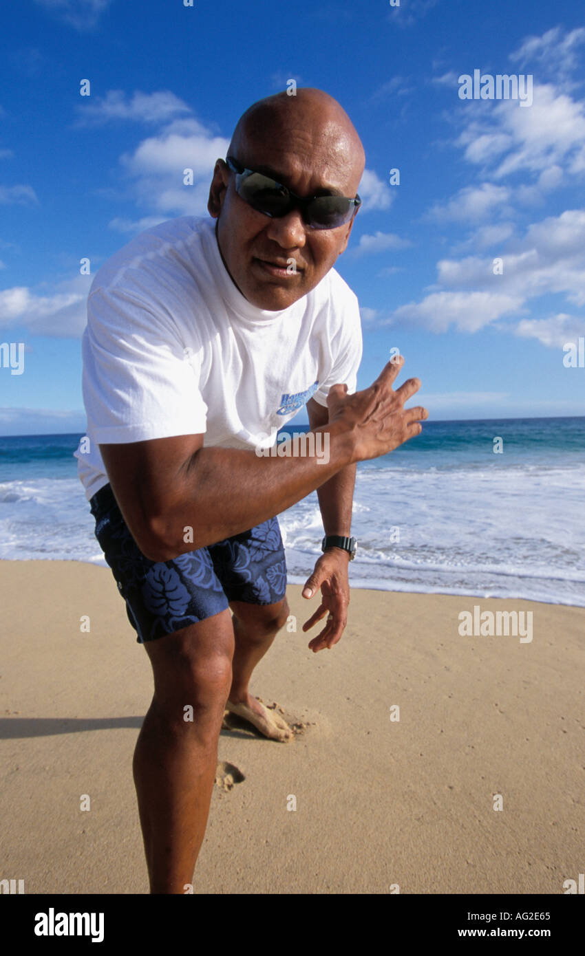 Hawaiian man on beach, Kauai, Hawaii Stock Photo - Alamy