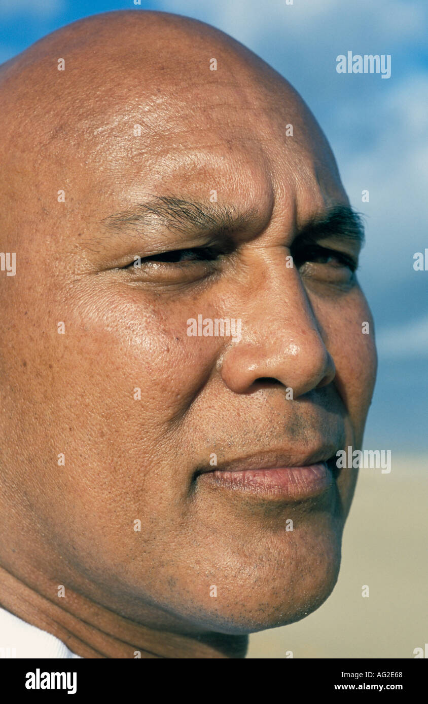 Hawaiian man on beach, Kauai, Hawaii Stock Photo - Alamy