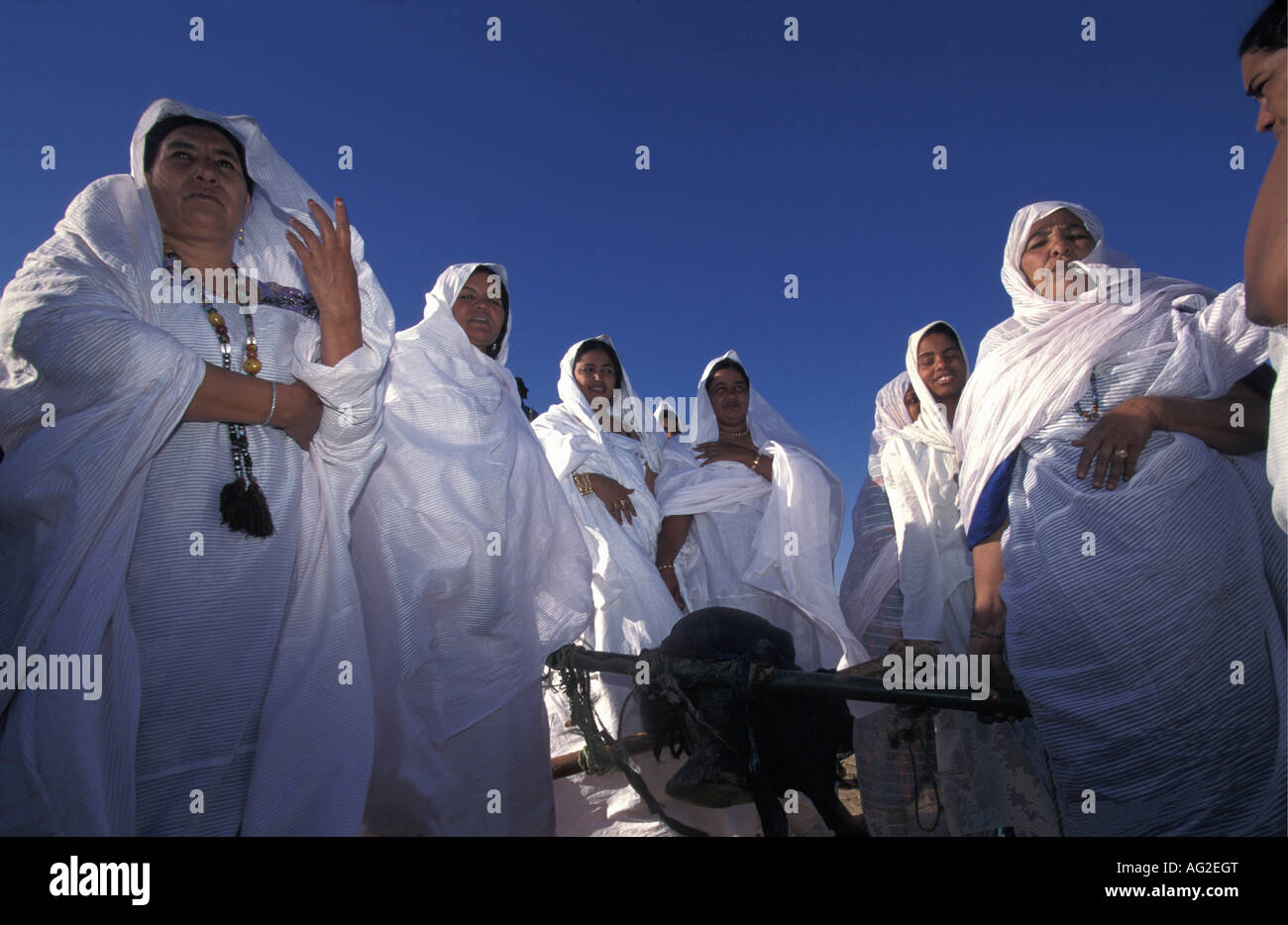 Algeria Tamanrasset Women of Tuareg tribe standing with Holy drum ...