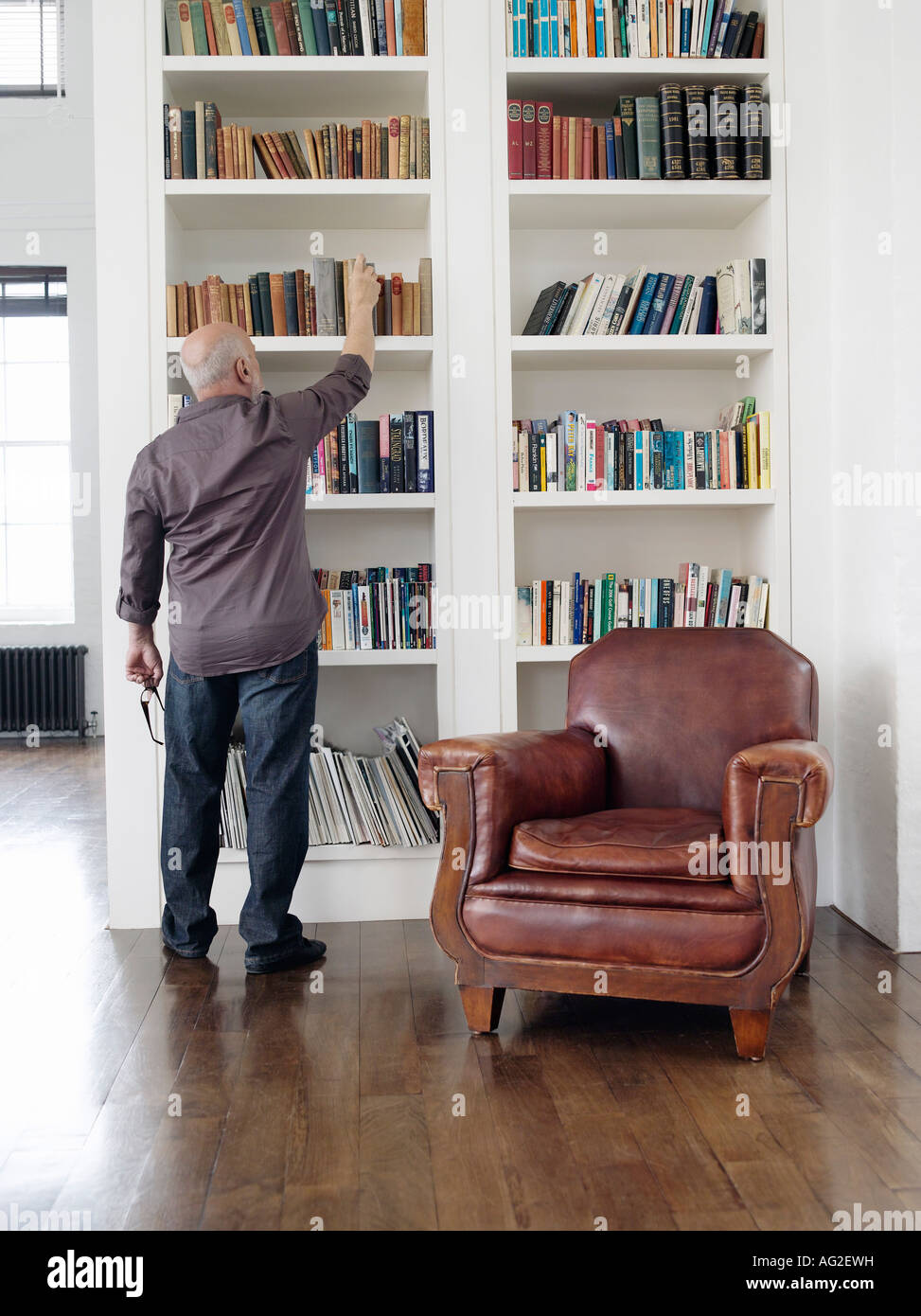 Man taking a book back view hi-res stock photography and images - Alamy