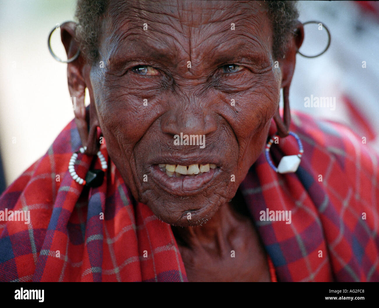 A Masai tribesman Kenya Africa showing years of life in his face Stock ...