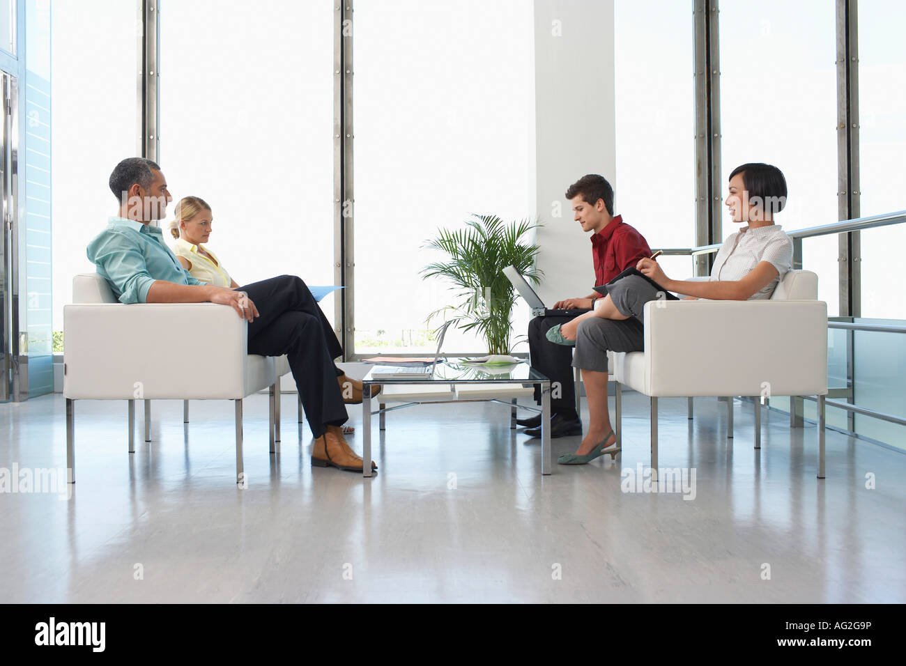 People sitting in modern waiting room Stock Photo - Alamy