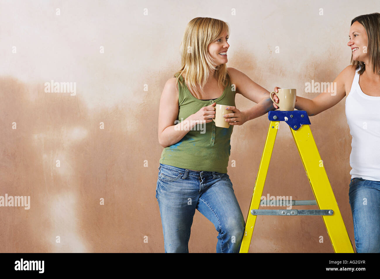 Two Women On Step Ladder High Resolution Stock Photography and Images ...