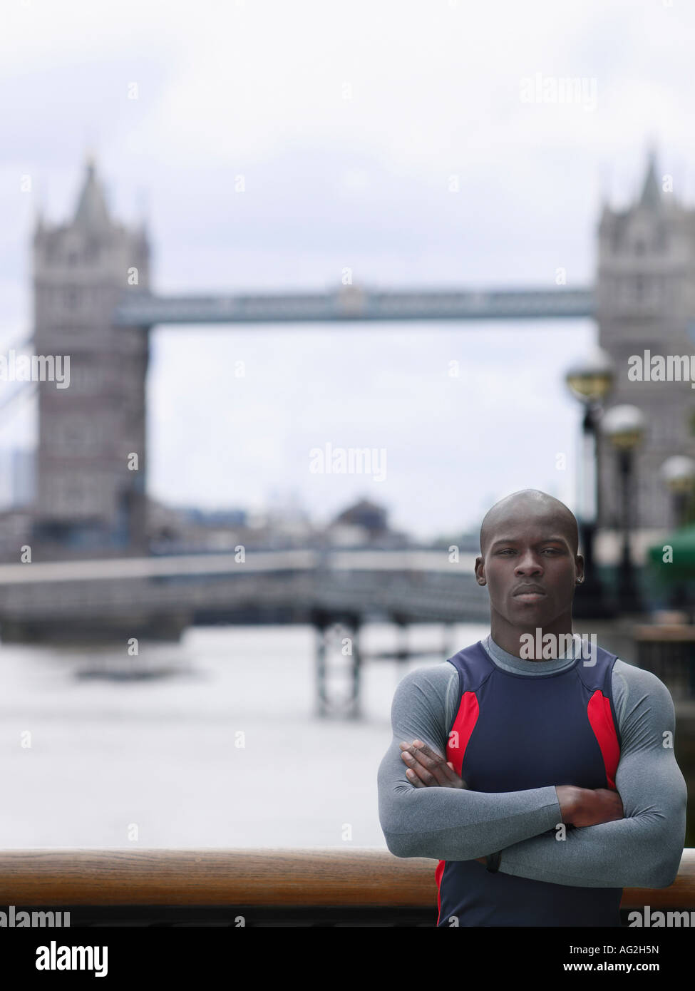 Man standing in front of Tower Bridge, England, London Stock Photo - Alamy