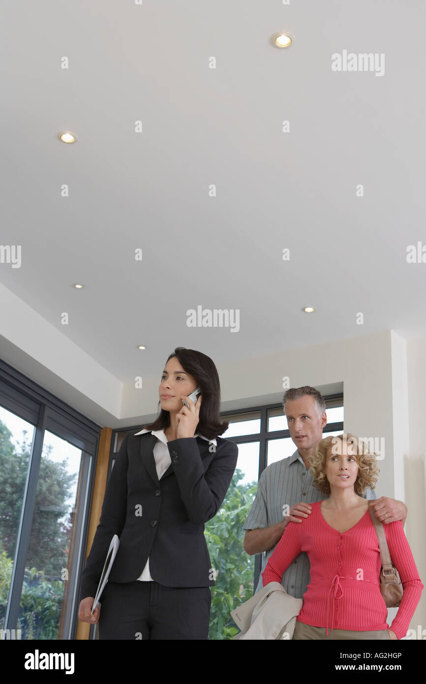 Standing real estate agent cellphone hi-res stock photography and ...