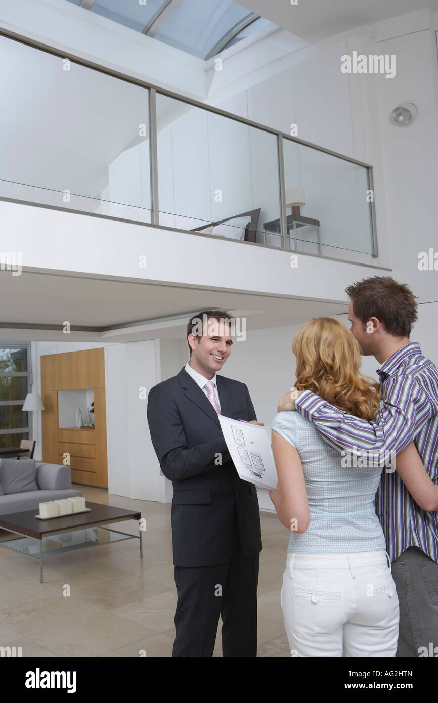 Agent showing around house hi-res stock photography and images - Alamy