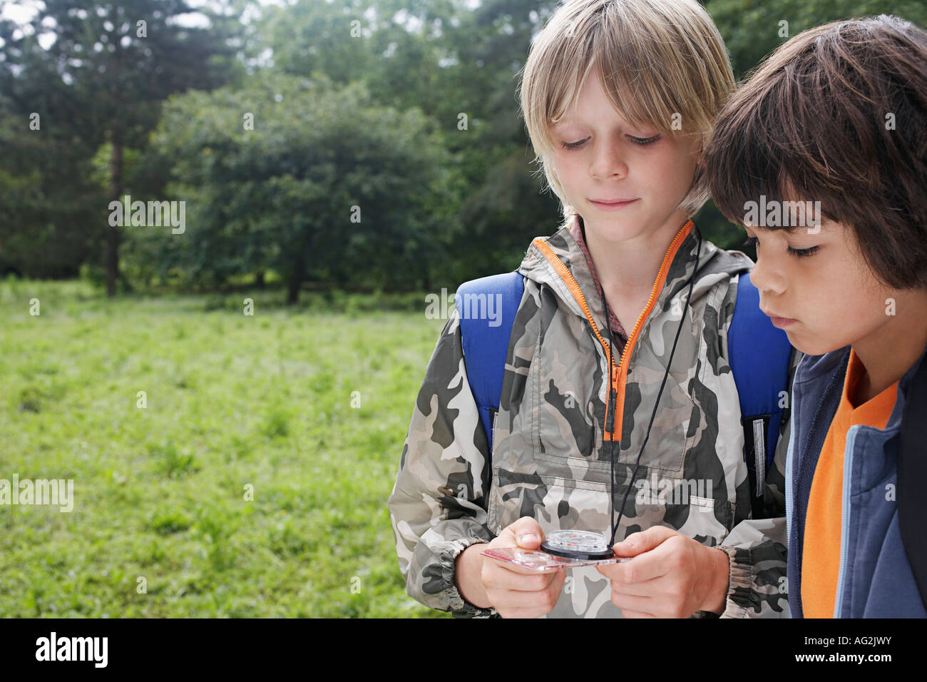 Child holding compass hi-res stock photography and images - Alamy