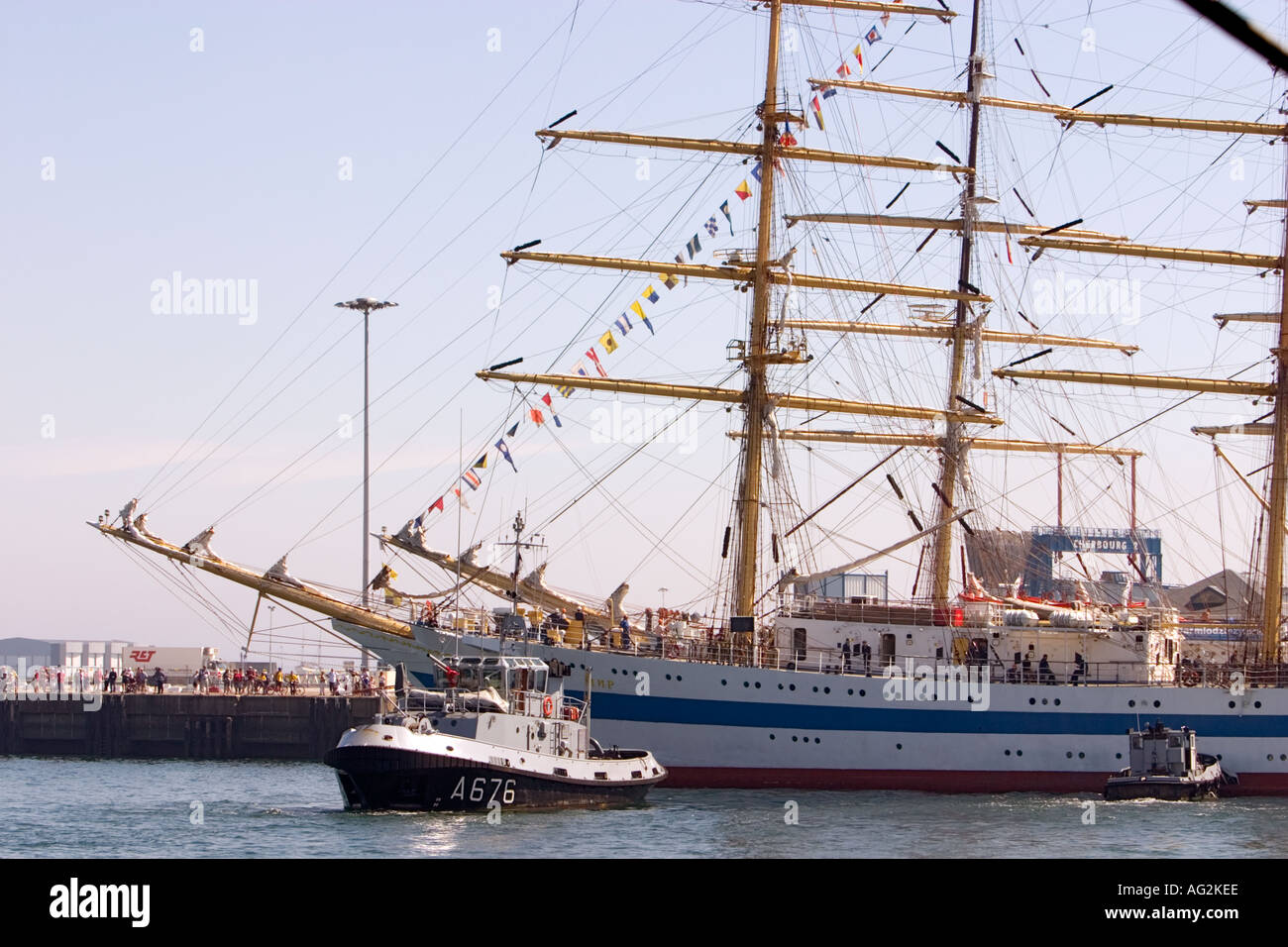 Russian training ship MIR is helped into dock by tug boat and harbour ...