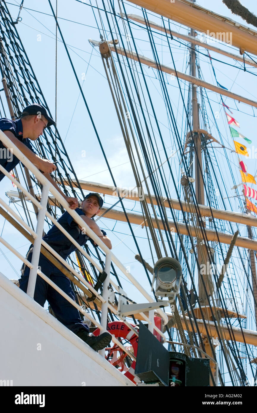 U S Coast Guard trainees chat on board USCG training ship Eagle docked ...