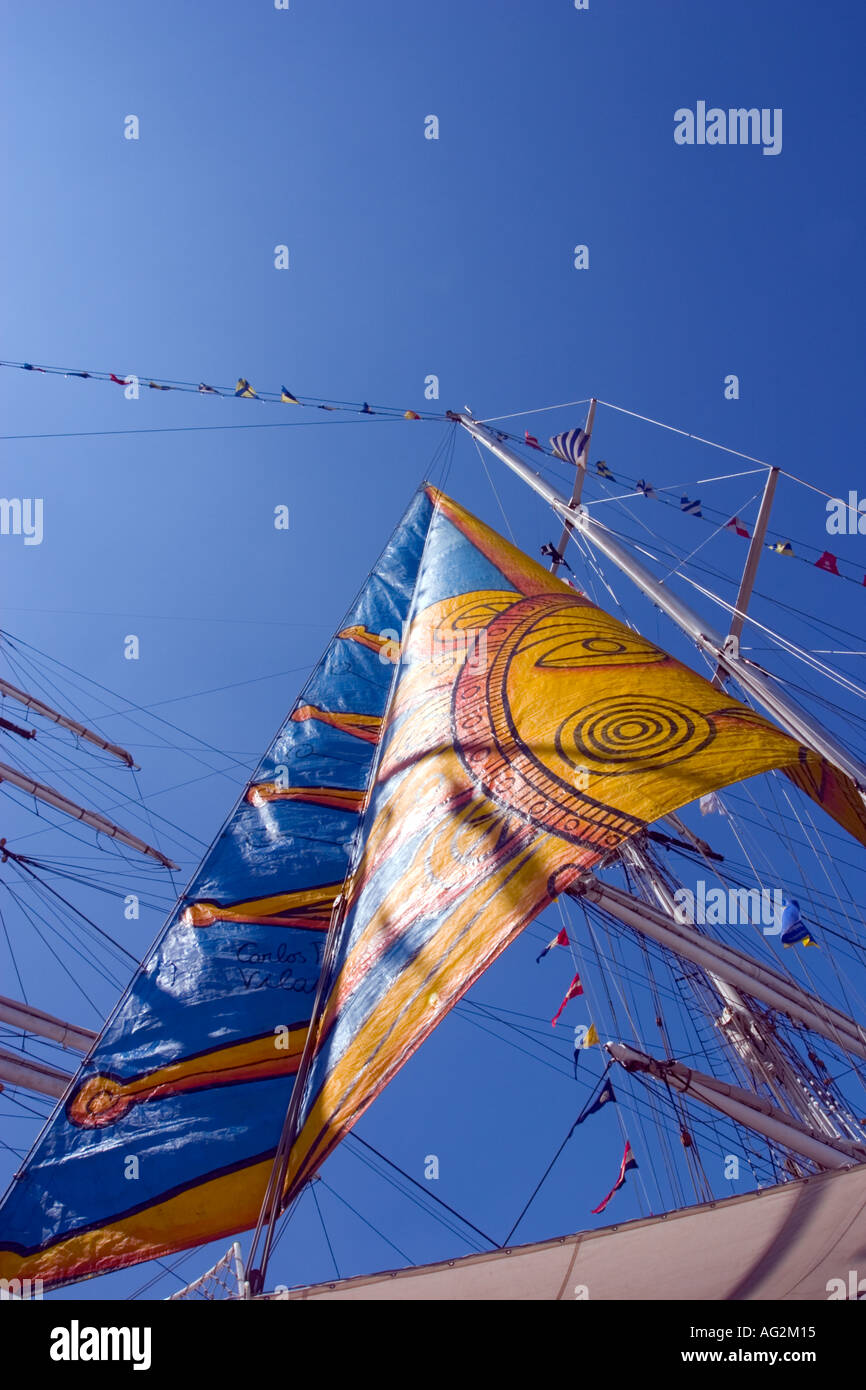 Colourful sail rigging and bunting on tall ship docked at Cherbourg ...
