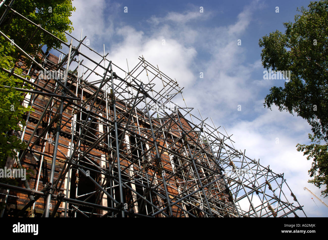 Brick building surrounded scaffolding hi-res stock photography and ...