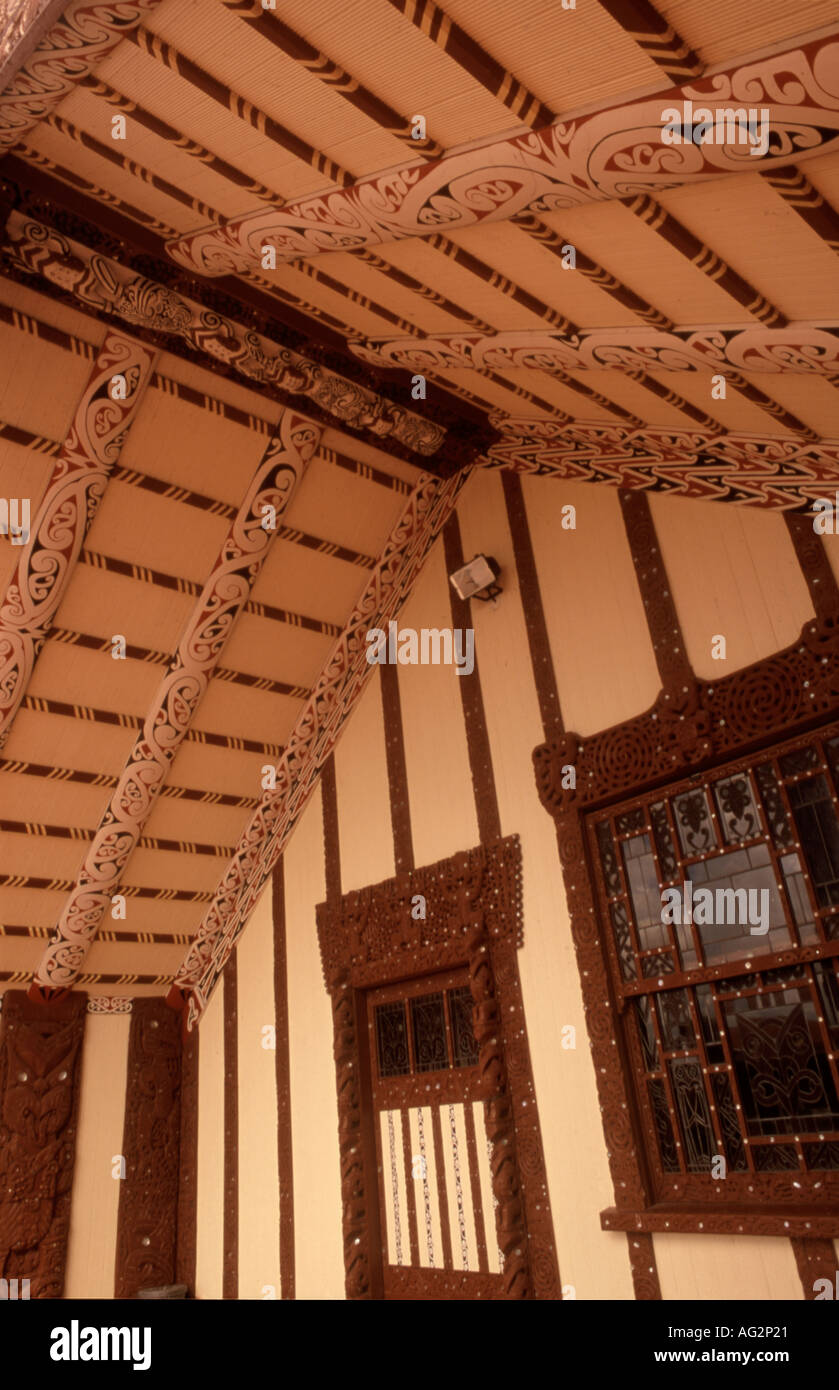 Traditional Maori whare meeting house showing traditional decoration ...
