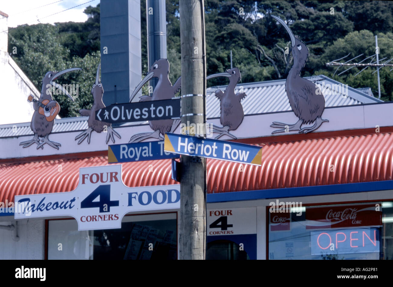 Cartoon Kiwis adorn the roof of a typical New Zealand corner dairy ...