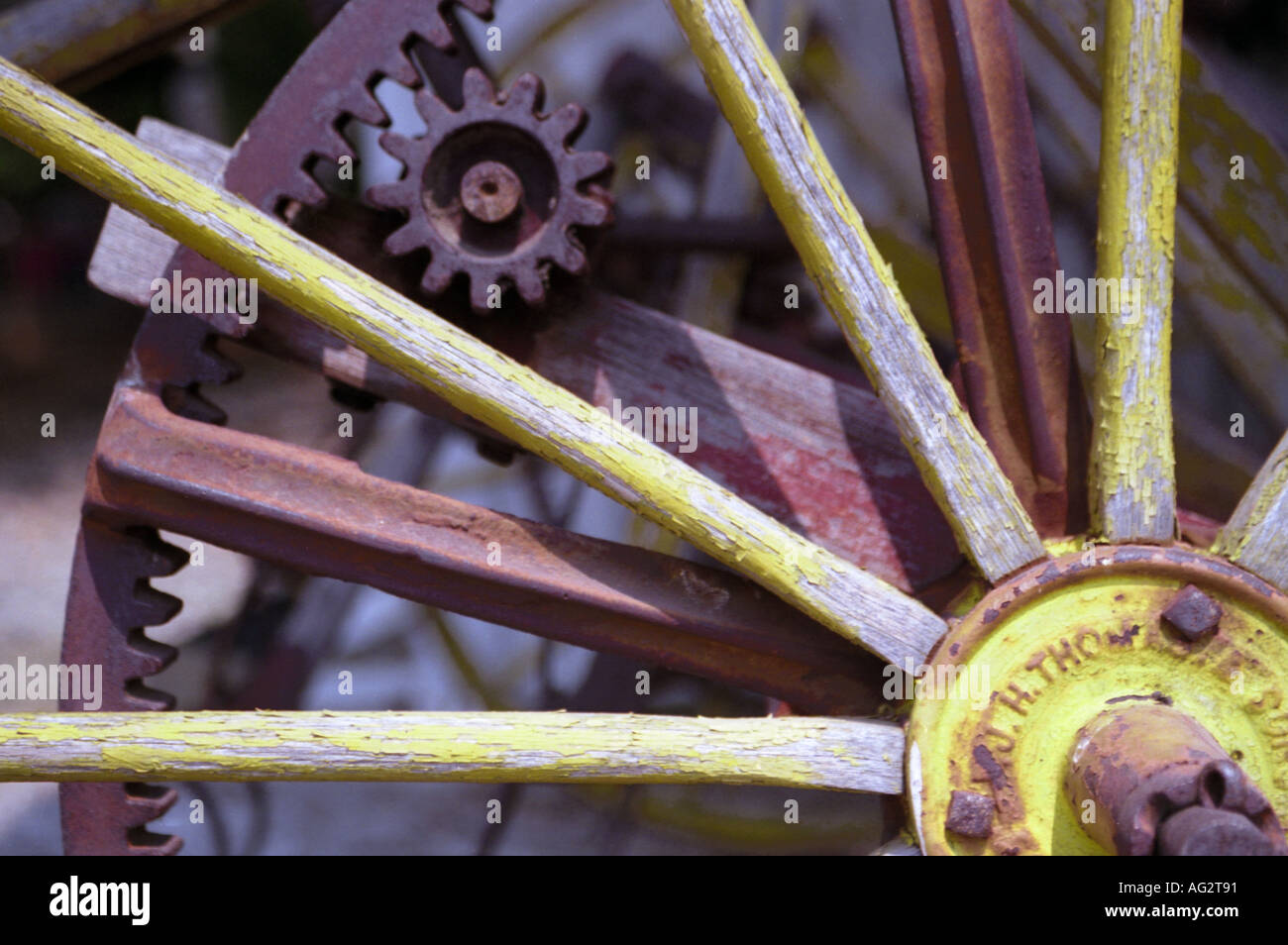 Wheel on antique farming equipment Stock Photo - Alamy