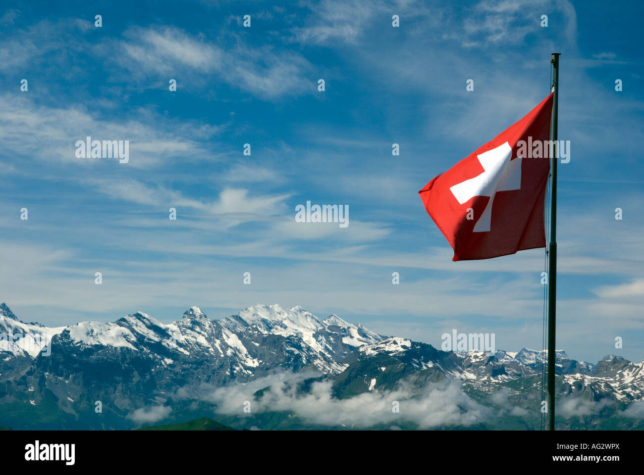 swiss flag and mountain panorama Stock Photo - Alamy