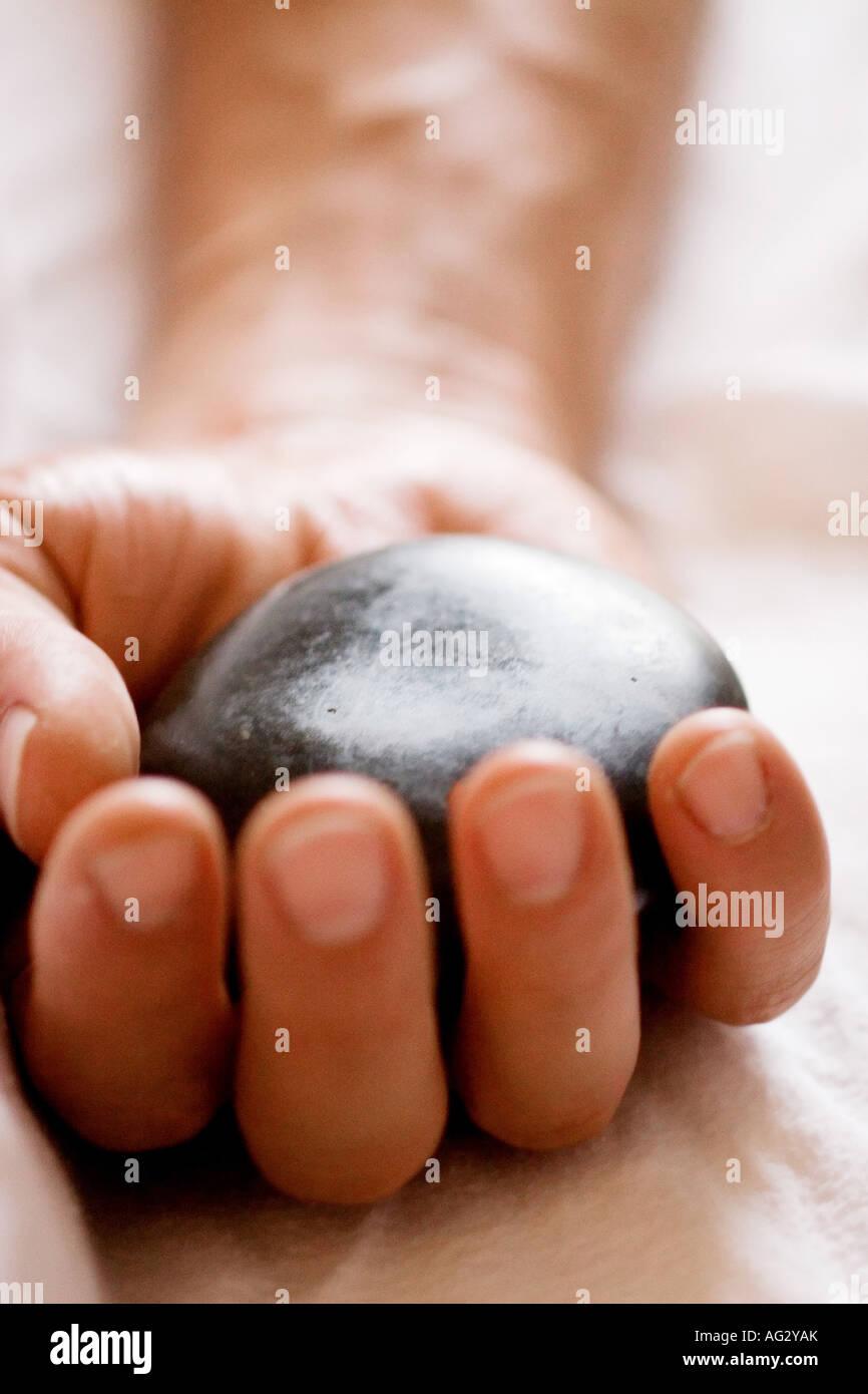 Stone therapy massage Stock Photo - Alamy
