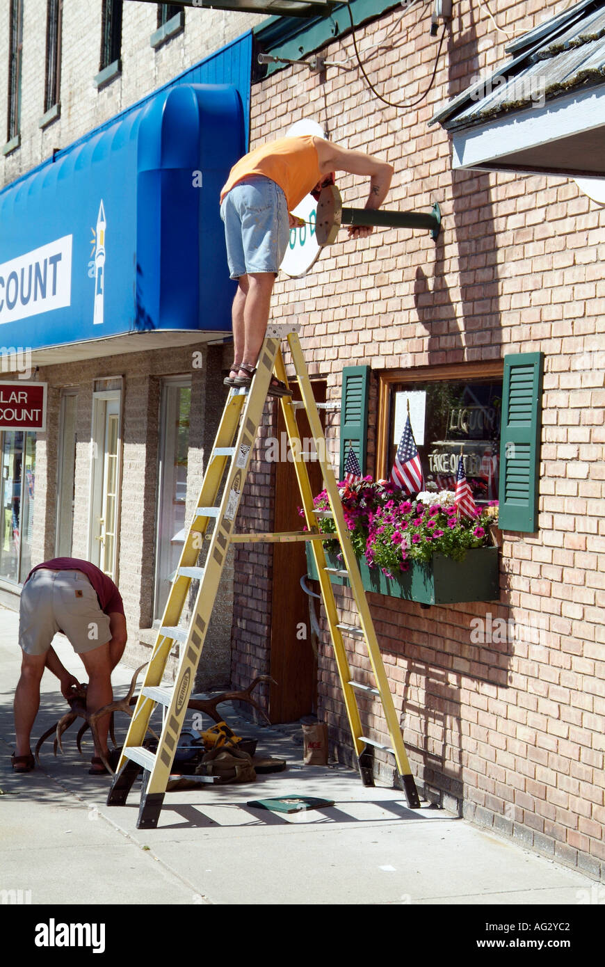 Precarious ladder hi-res stock photography and images - Alamy