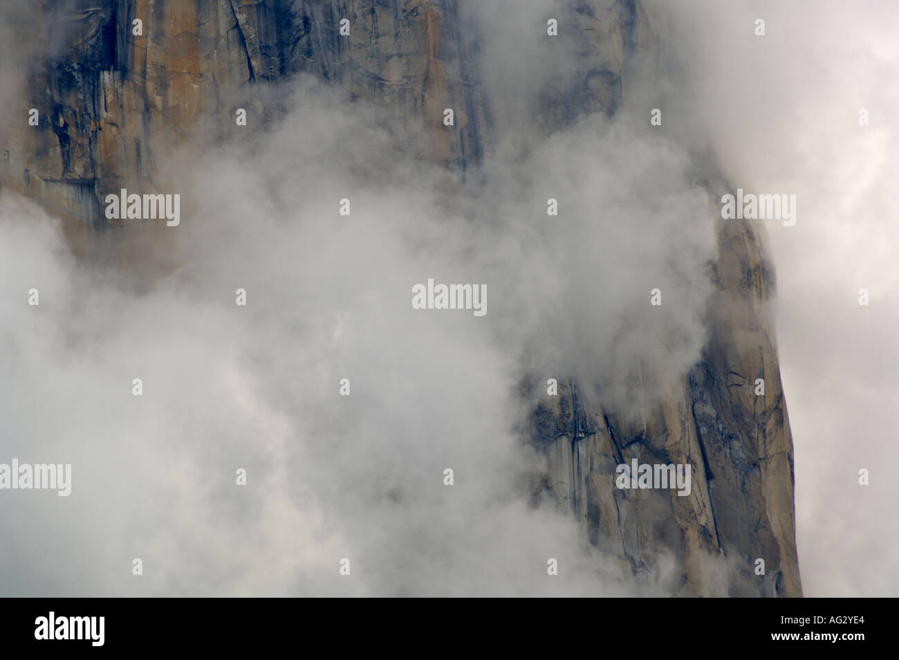 Sheer steep rock cliff face cloud hi-res stock photography and images ...