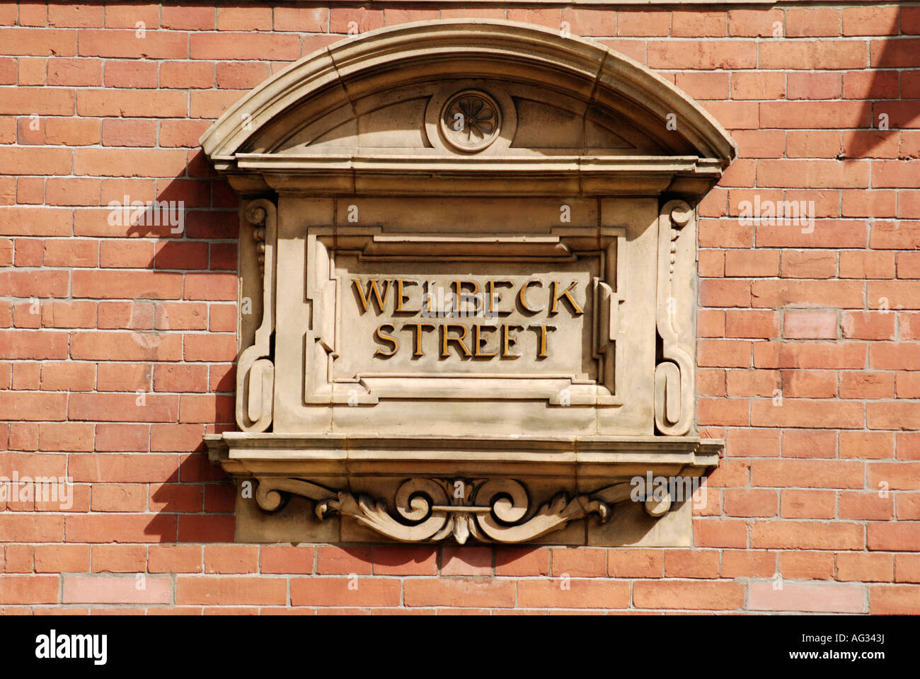 Ornate Welbeck Street old stone street sign on London England Stock ...
