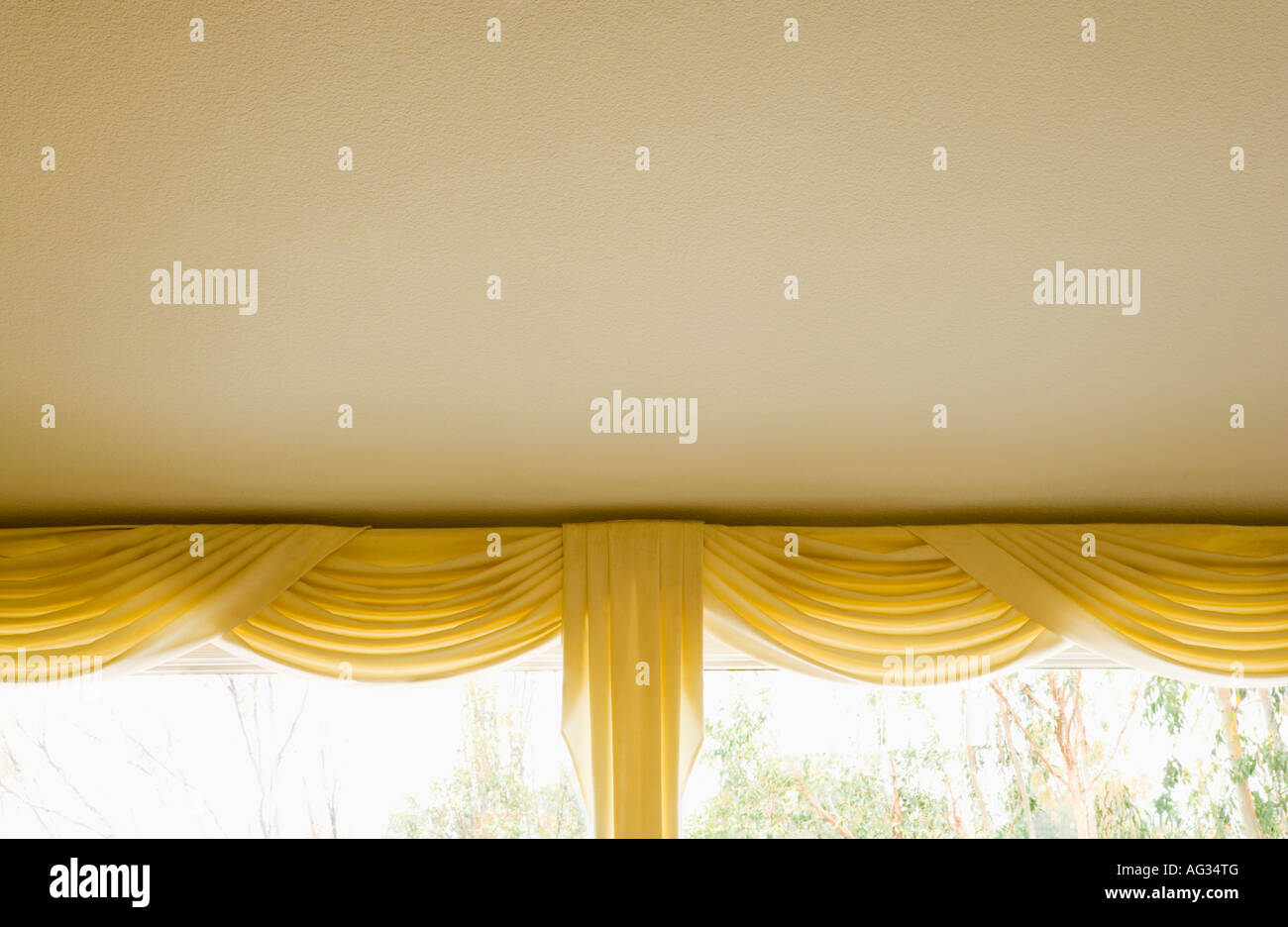 Yellow Valance and Curtains on Window Stock Photo - Alamy