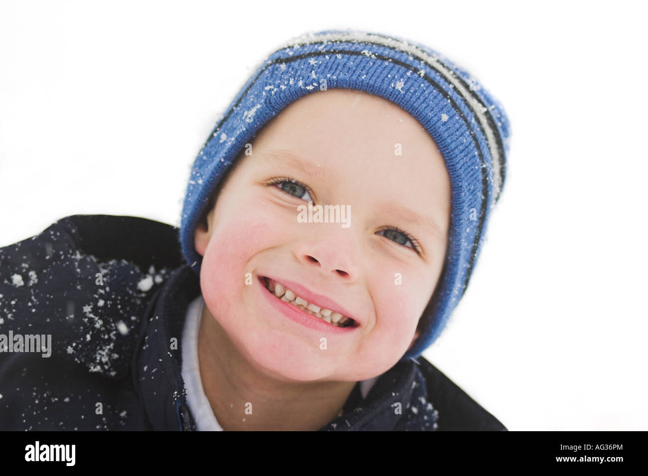 A child smiles gleefully as he has the time of his life playing in the ...