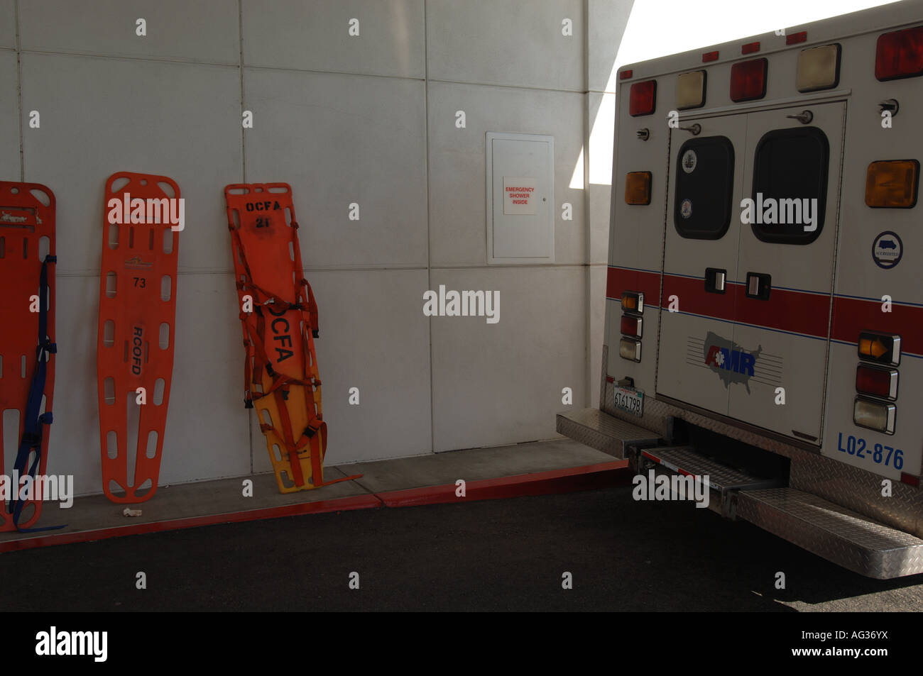 Ambulance backed up to the emergency room door where spinal restraints ...
