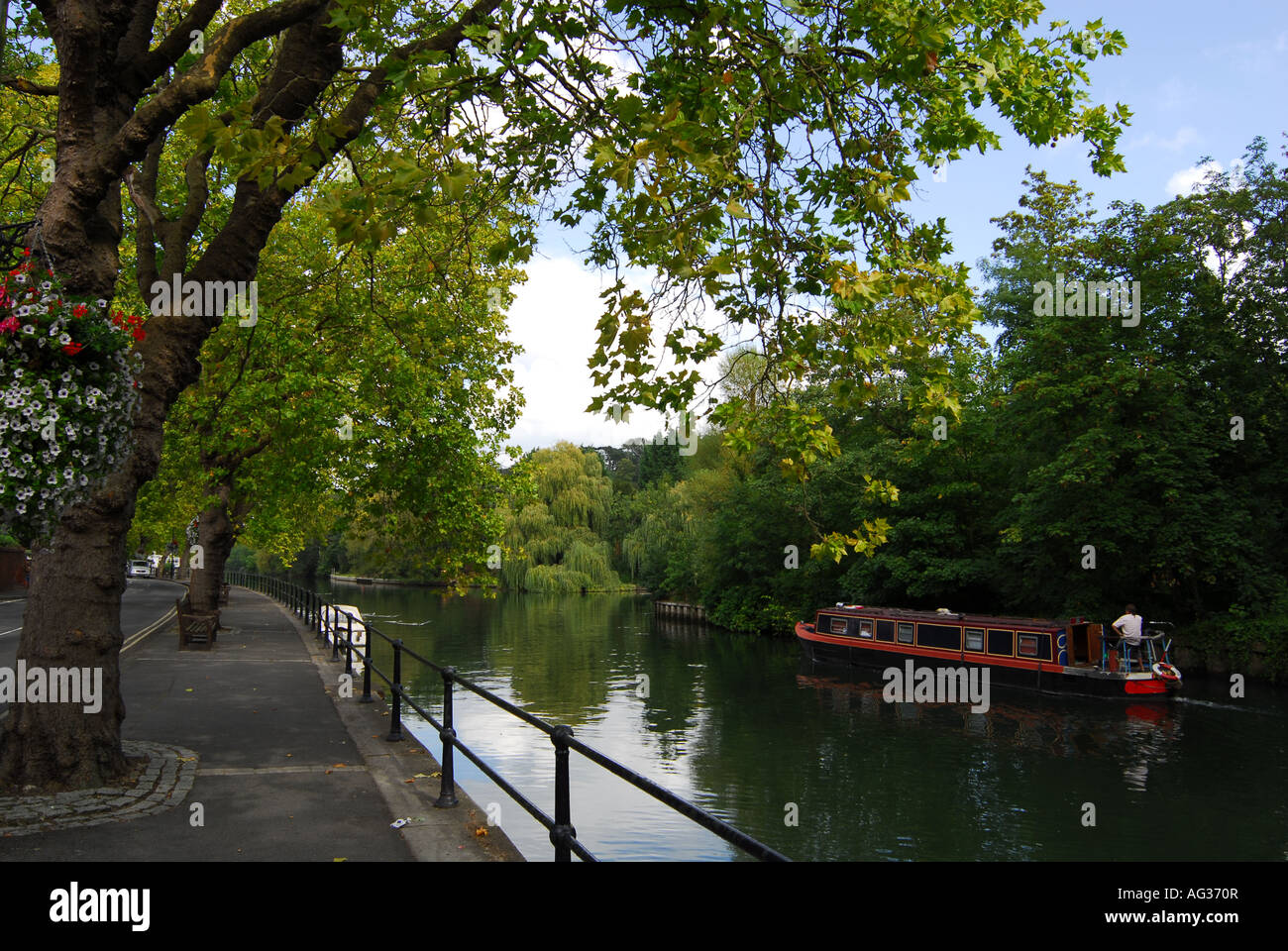 A barge cruises down the river Thames at Maidenhead Stock Photo - Alamy