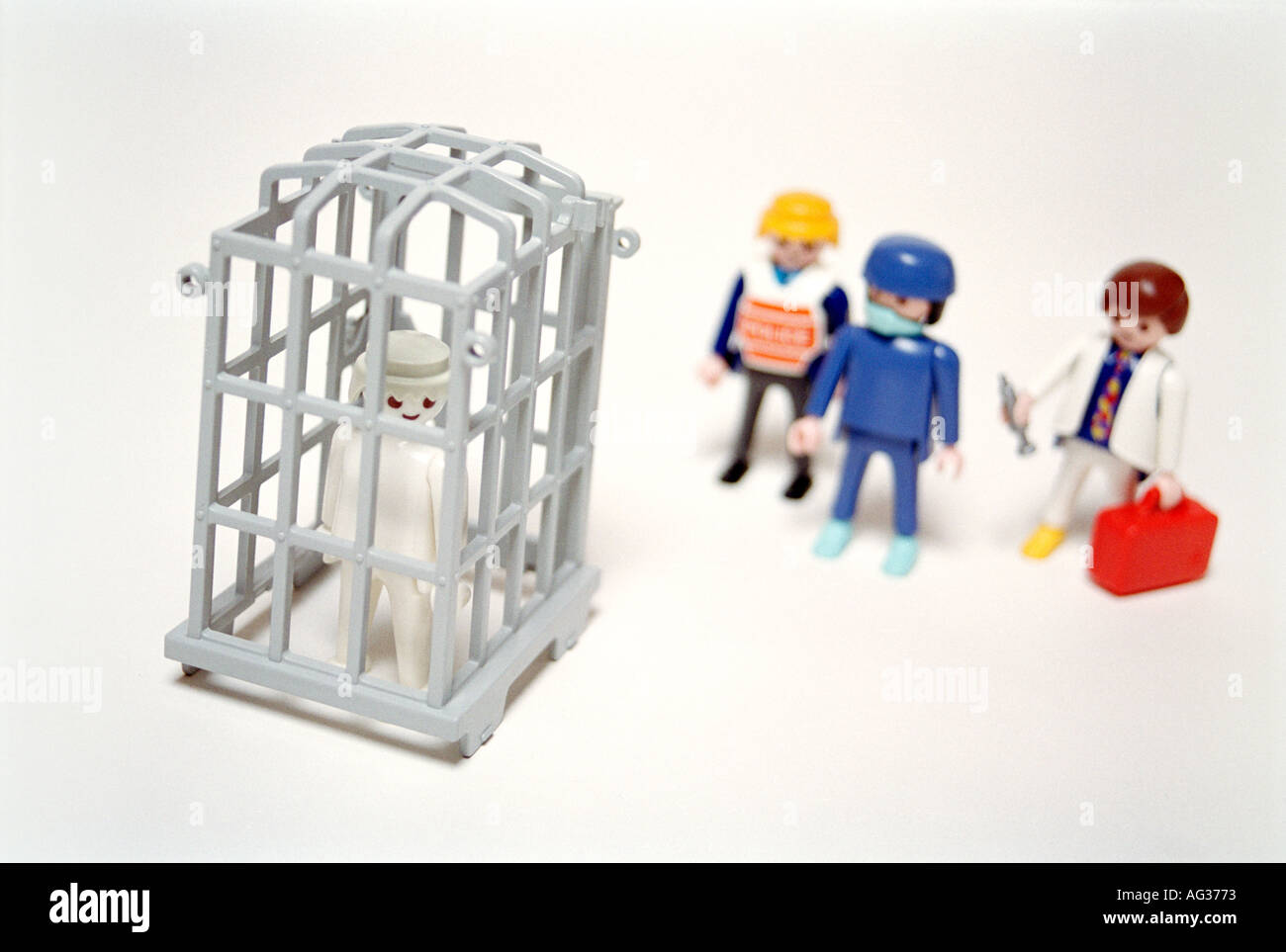 Prisoner supervised by other people Stock Photo - Alamy