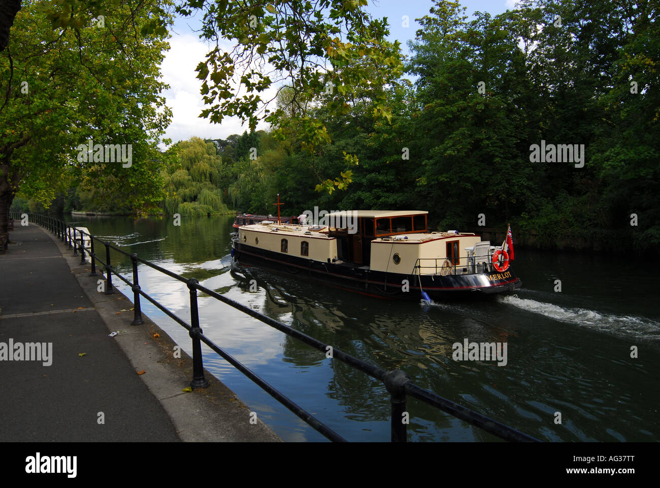 A barge cruises down the river Thames at Maidenhead Stock Photo - Alamy