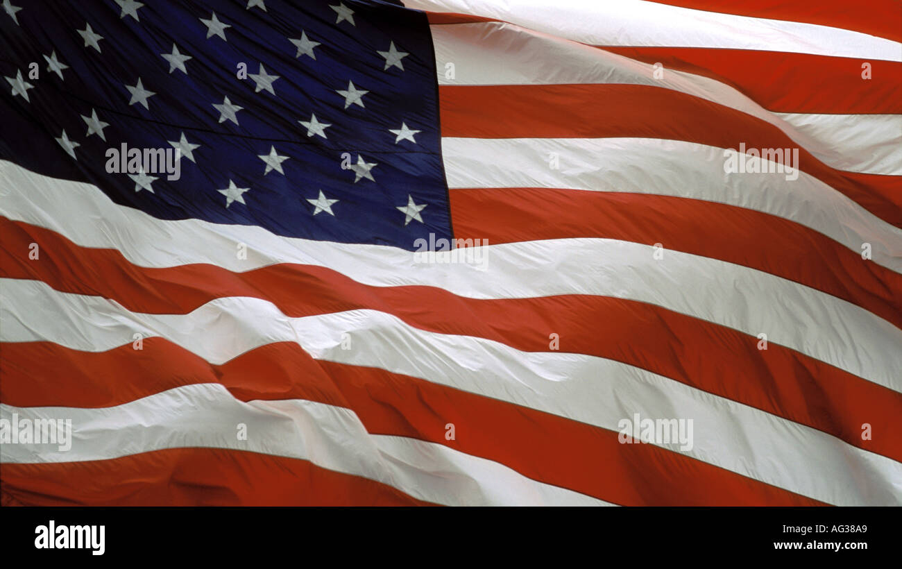 The us flag fluttering in the breeze hi-res stock photography and ...