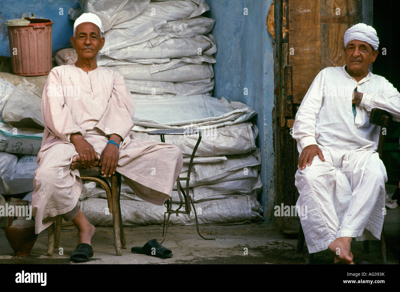 Shopkeepers wearing traditional jellabiya or "galabeya" clothing in ...