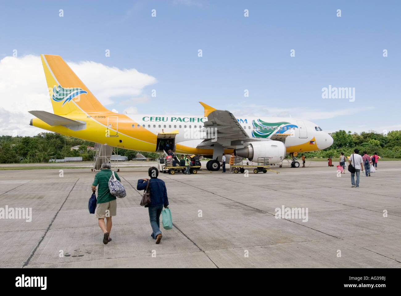 Passengers Walking On Tarmac To Board Cebu Pacific Airplane Philippines ...
