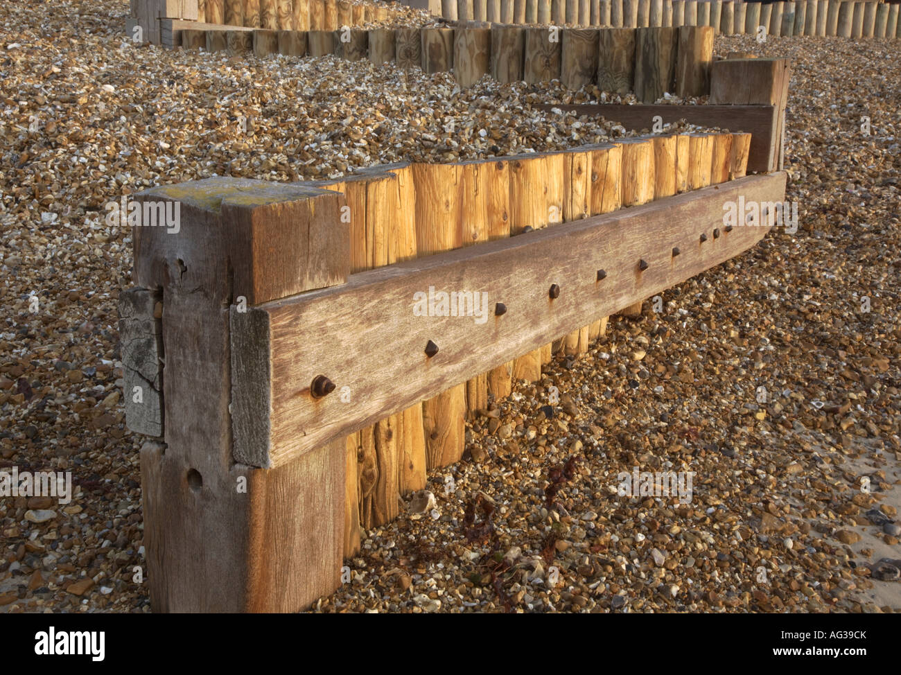 Wooden groynes for Sea Defence at Shingle Beach at Calshot in Hampshire ...