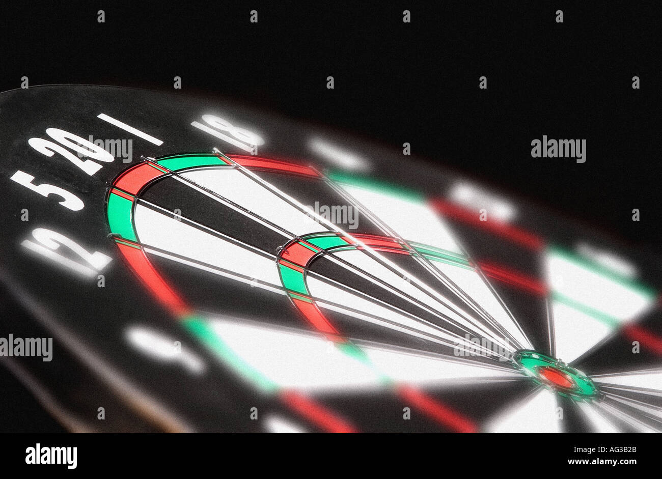 angled photo of dart board showing bullseye and numbers Stock Photo - Alamy