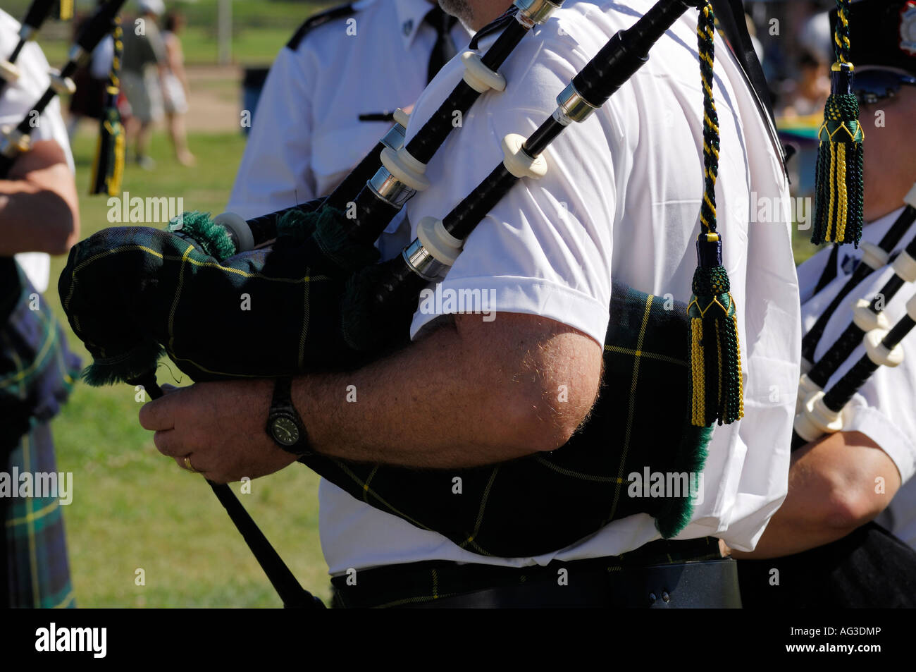 Bagpipers playing the bagpipes at a Highland Games gathering Stock ...