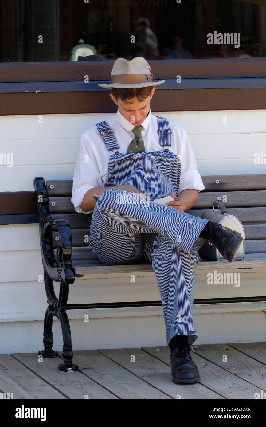 Worker at a historical attraction dressed up in period costume and ...