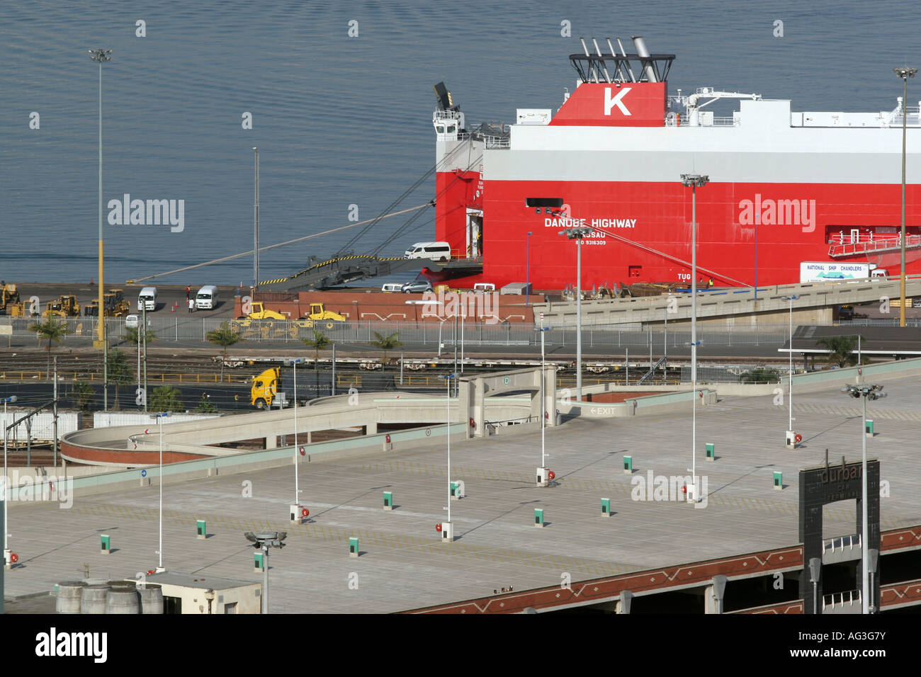 Imported mini busses disembarking from a cargo ship in Durban Harbour ...