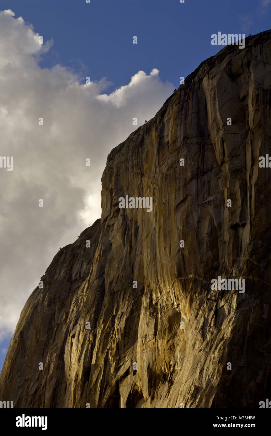 Clouds and sheer granite cliff wall of El Capitan above Yosemite Valley ...