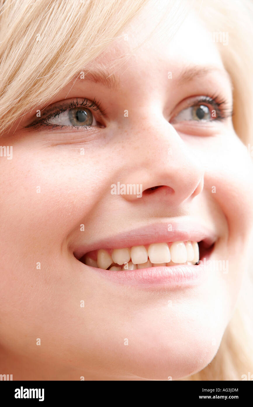 A smiling young woman with healthy teeth Stock Photo - Alamy