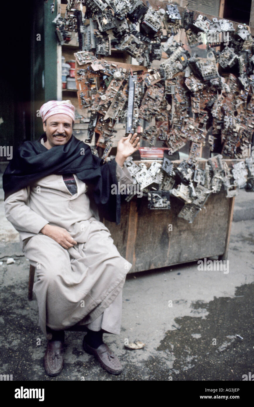 Merchant in front of his electronic shop in Khan el Khalil market Cairo ...