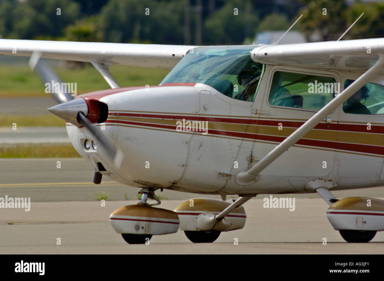 Small Cessna single engine airplane taxiing on taxiway at Buchanan ...