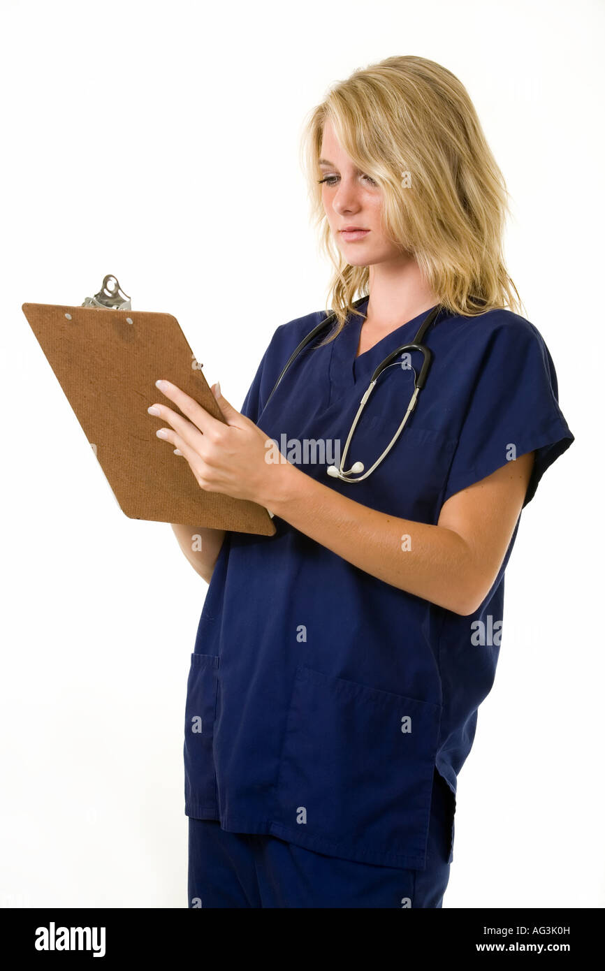 Blond nurse with chart Stock Photo - Alamy
